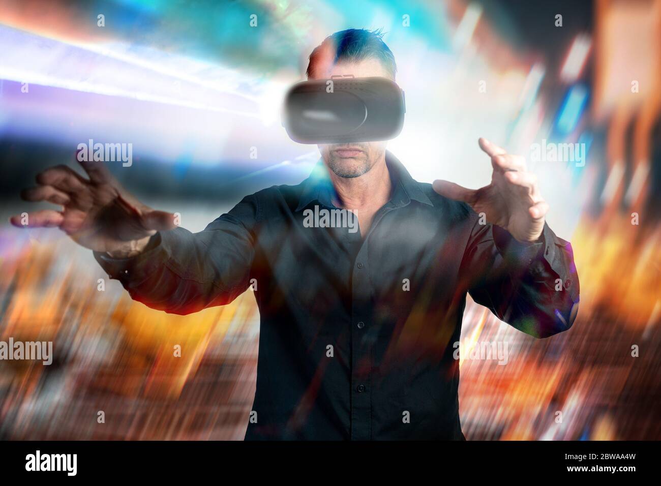 Male business using black virtual reality headset glasses Stock Photo ...