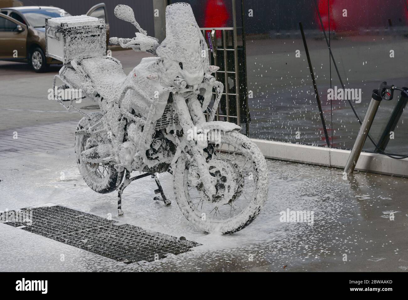 Motorcycle washing with cleaning foam. Pure moto bike. Enduro ...
