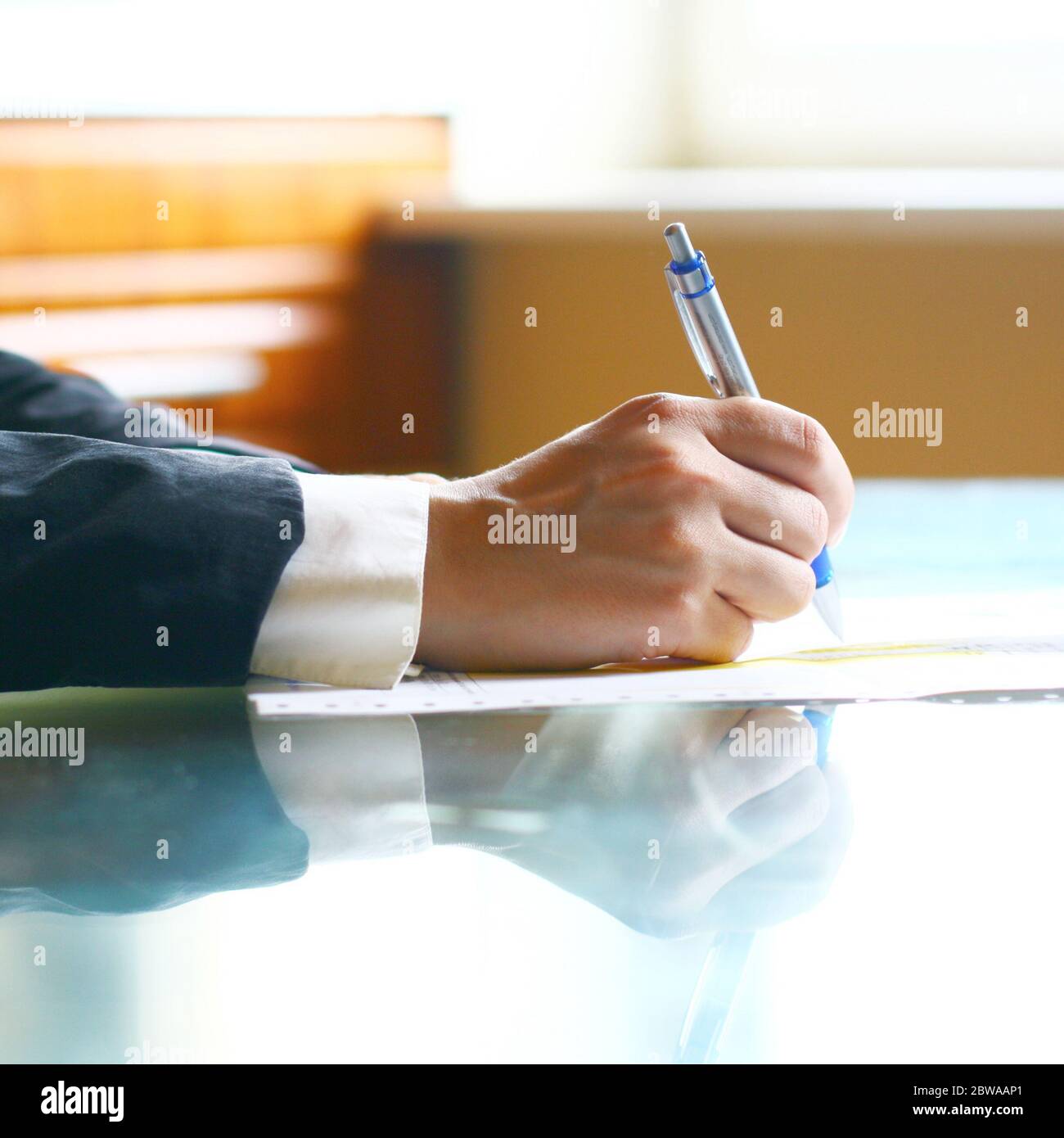 pen work hand close up business background Stock Photo - Alamy