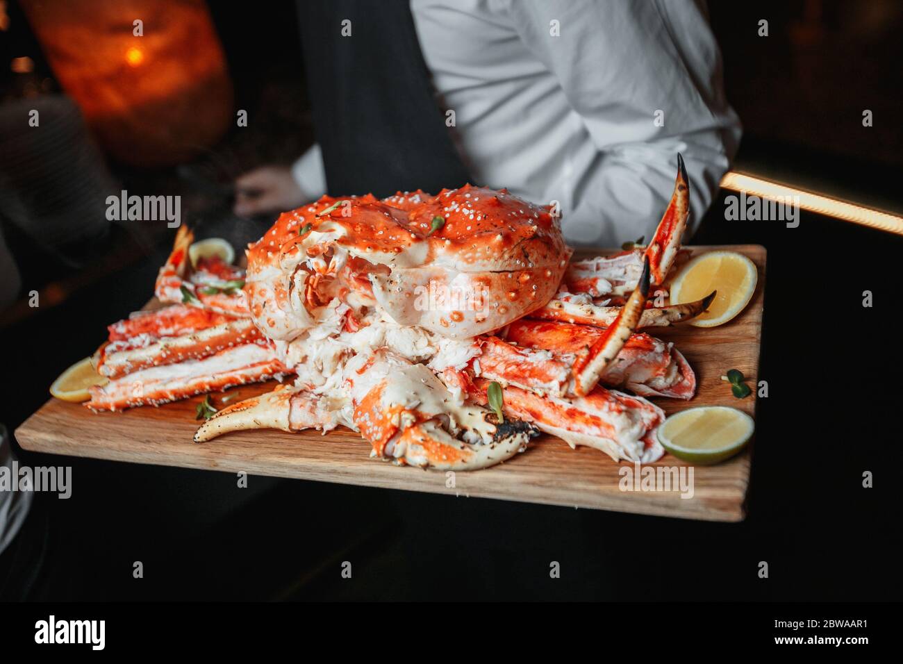 Royal crab with lime on a dsock Stock Photo - Alamy
