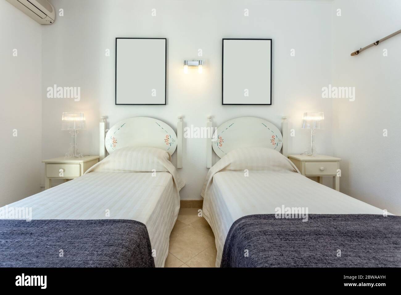 Modern bedroom with two single beds. European hotel design Stock Photo - Alamy