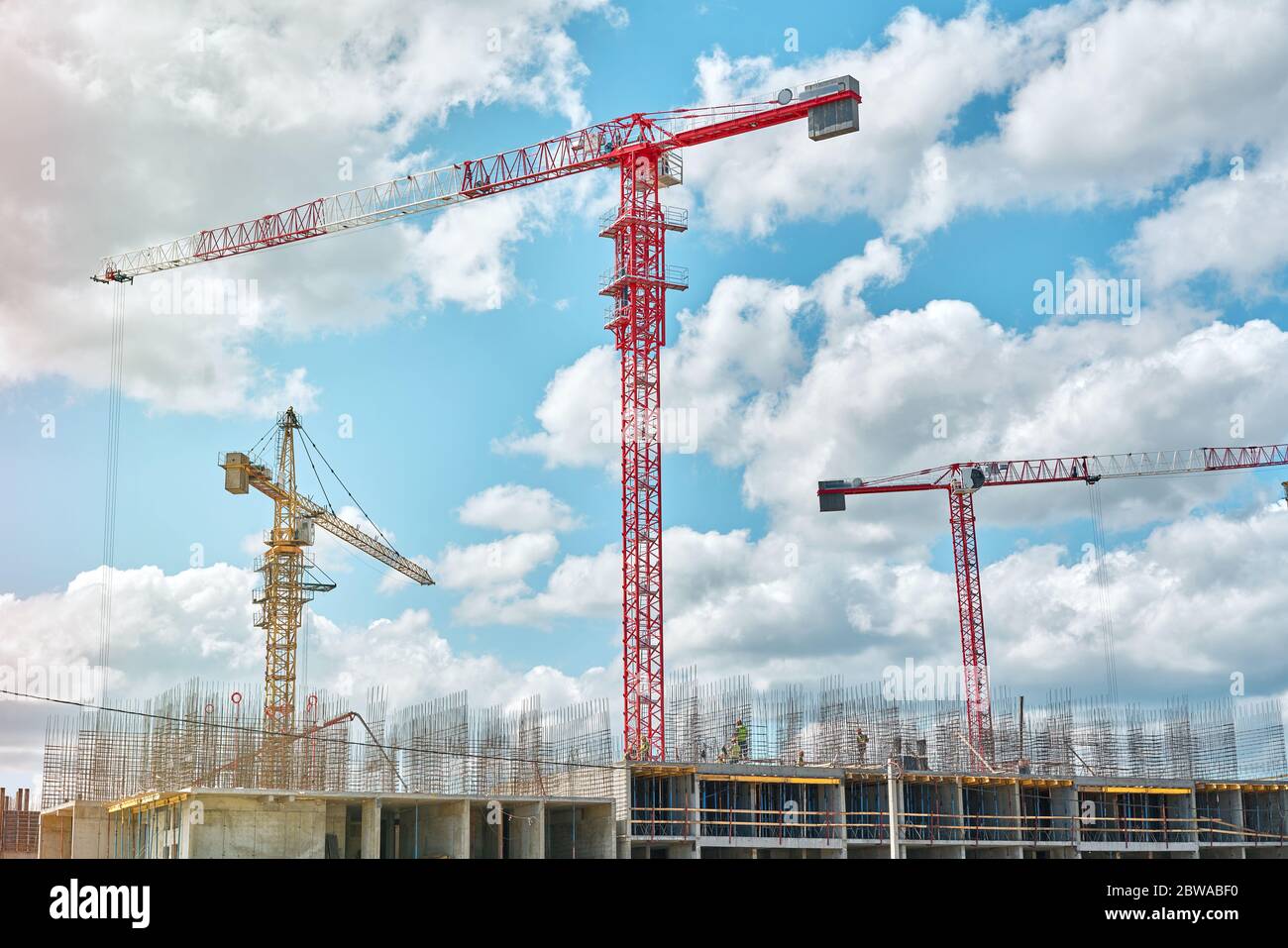 tower cranes on a construction site Stock Photo - Alamy