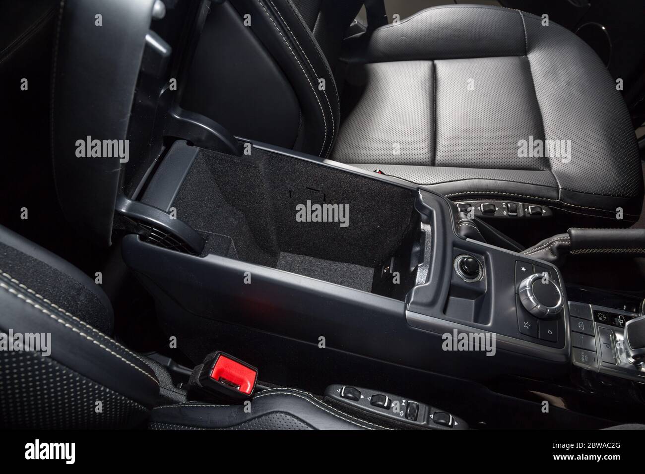 Storage compartment in car interior Stock Photo - Alamy