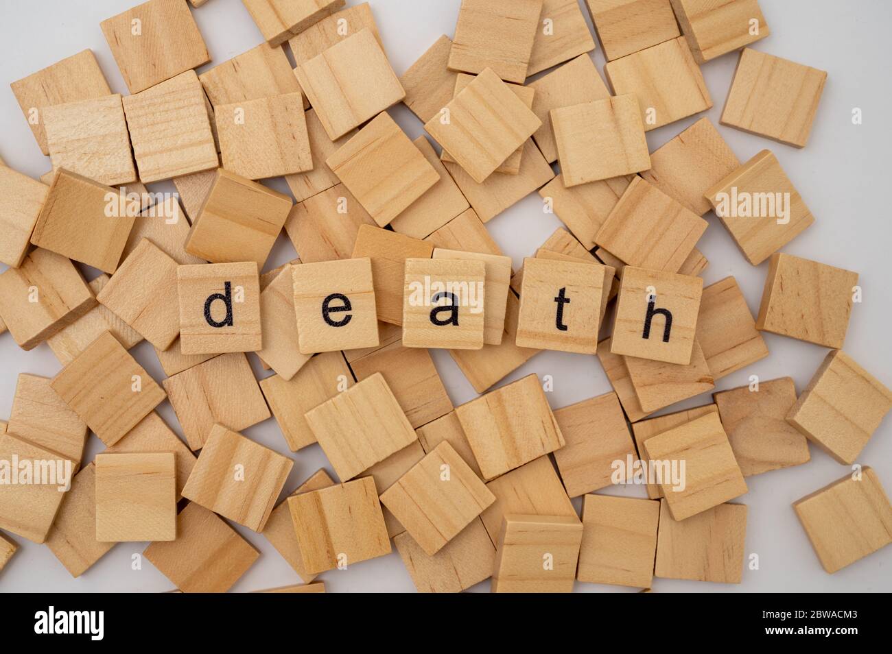 Wooden letter tiles spelling the word DEATH Stock Photo - Alamy