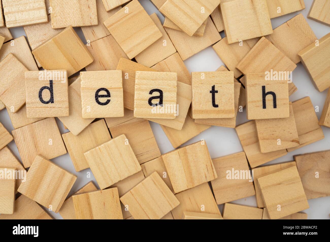 Wooden letter tiles spelling the word DEATH Stock Photo - Alamy