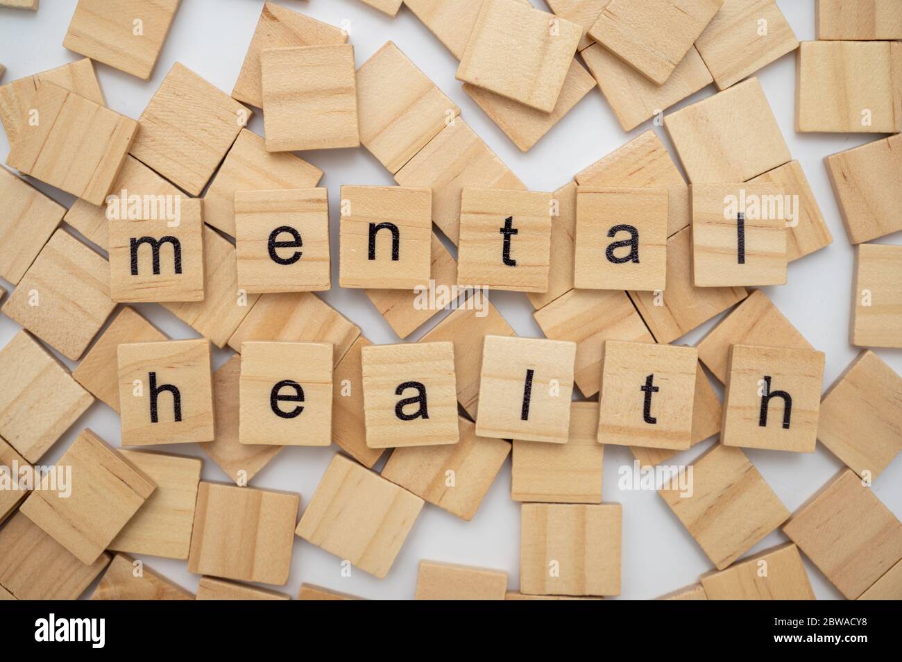 Wooden letter tiles spelling word MENTAL HEALTH Stock Photo - Alamy