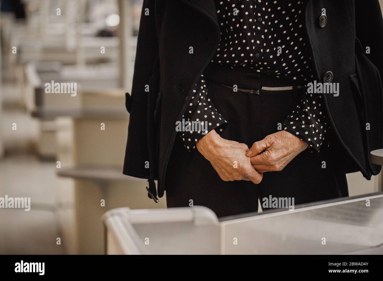 Middle aged woman scanning hi-res stock photography and images - Alamy