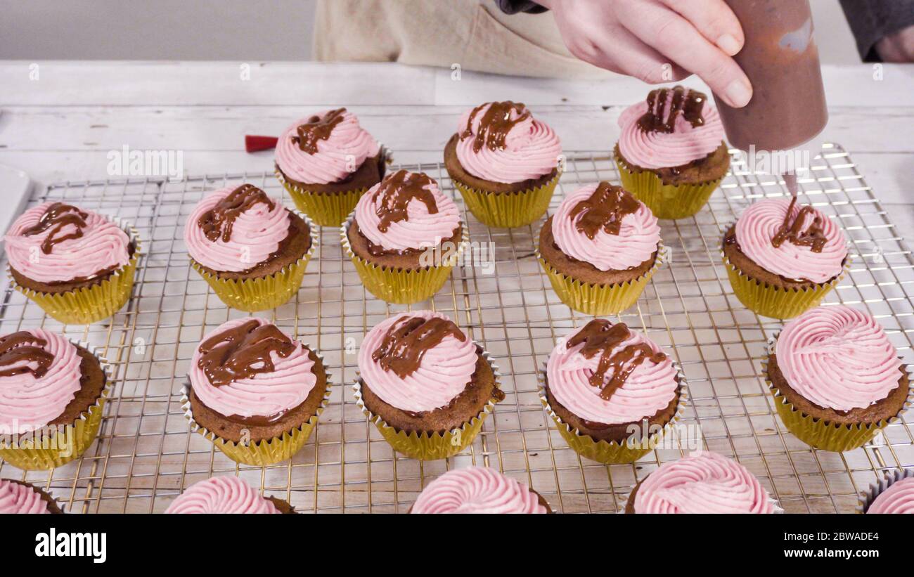 Drizzling chocolate ganache on top hi-res stock photography and images ...