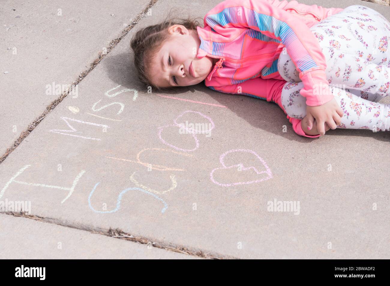 I miss school chalk sign in driveway Stock Photo - Alamy