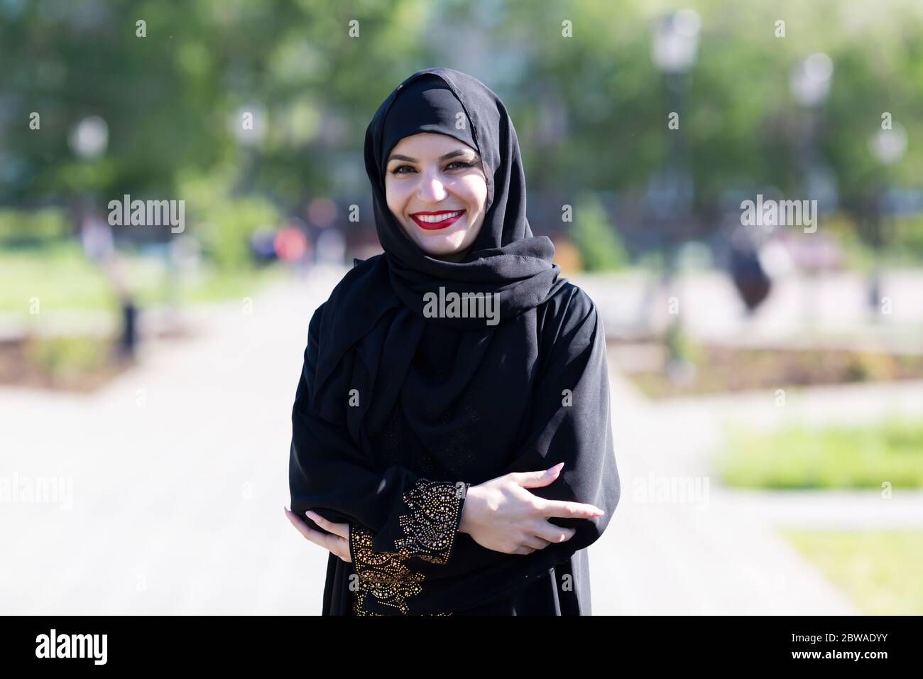 Islamic woman in national dress black clothes close-up Stock Photo - Alamy