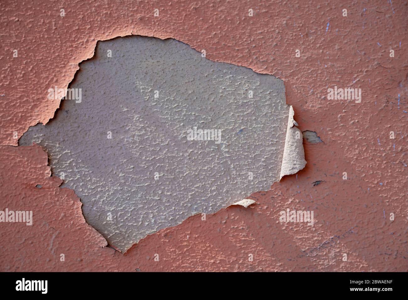 Chipped paint on rough stucco wall texture. Facade relief painted ...