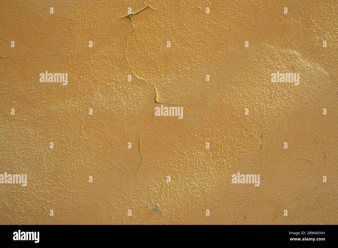 Yellow rough stucco wall texture cracked and chipped Stock Photo - Alamy