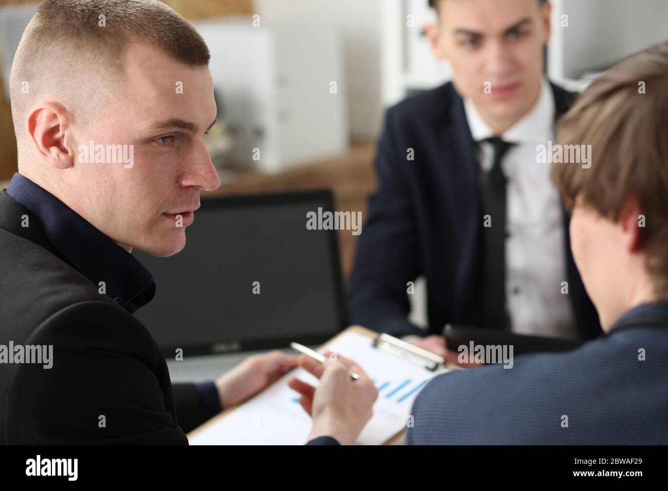 Group of people deliberate on problem Stock Photo - Alamy