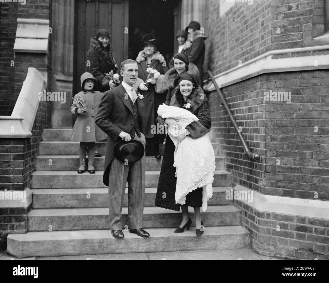 Lieutenant Commander and Mrs Robinson Gordon and their infant son after ...