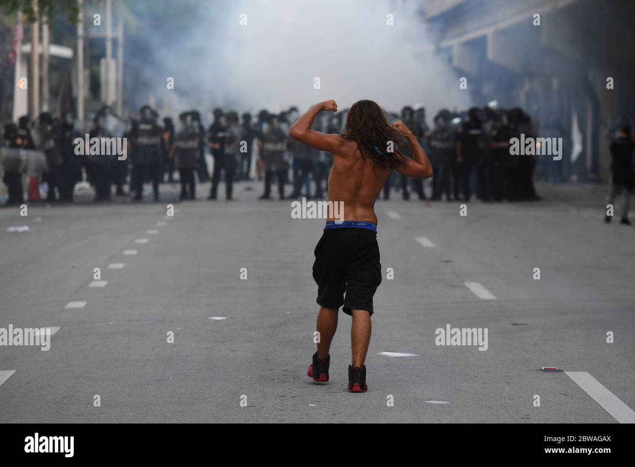 Miami, FL, USA. 30th May, 2020. A Protestor is seen taunting Miami ...