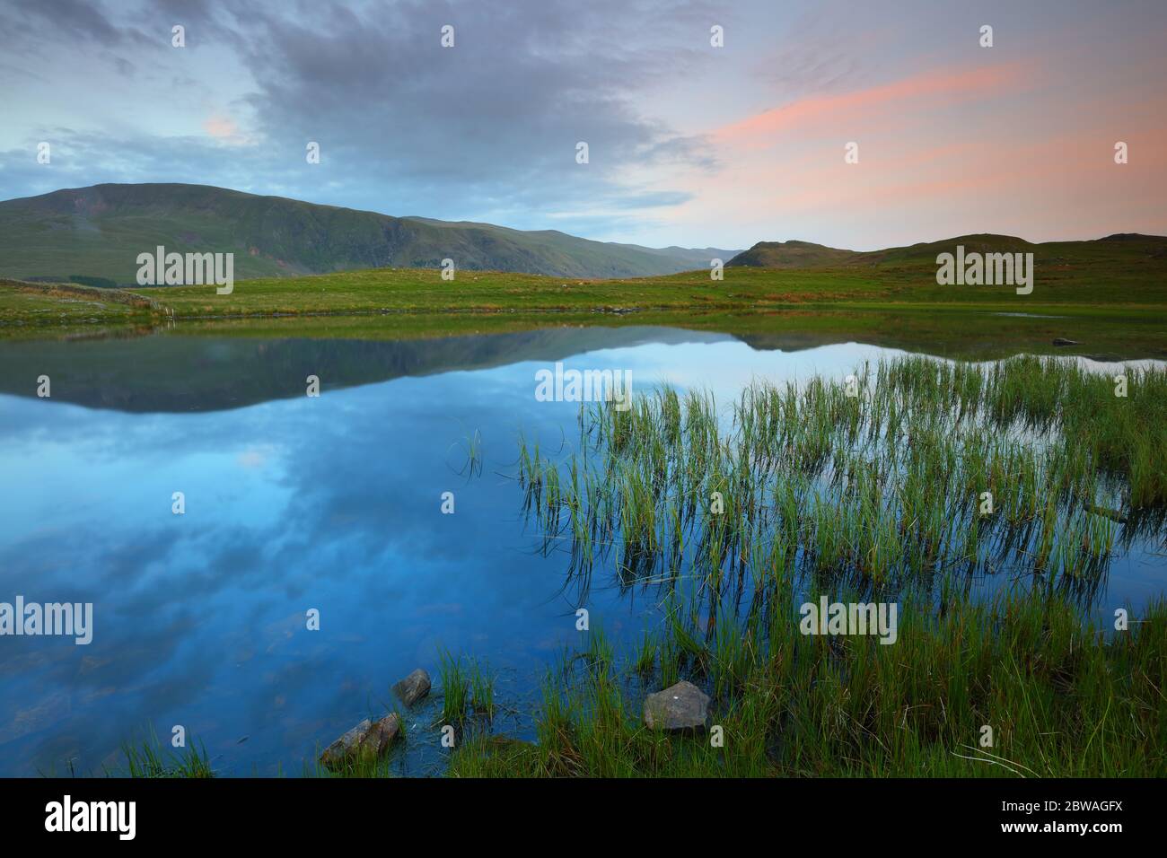 Calm Evening at Tewet Tarn with Clough Head in the background. Lake ...