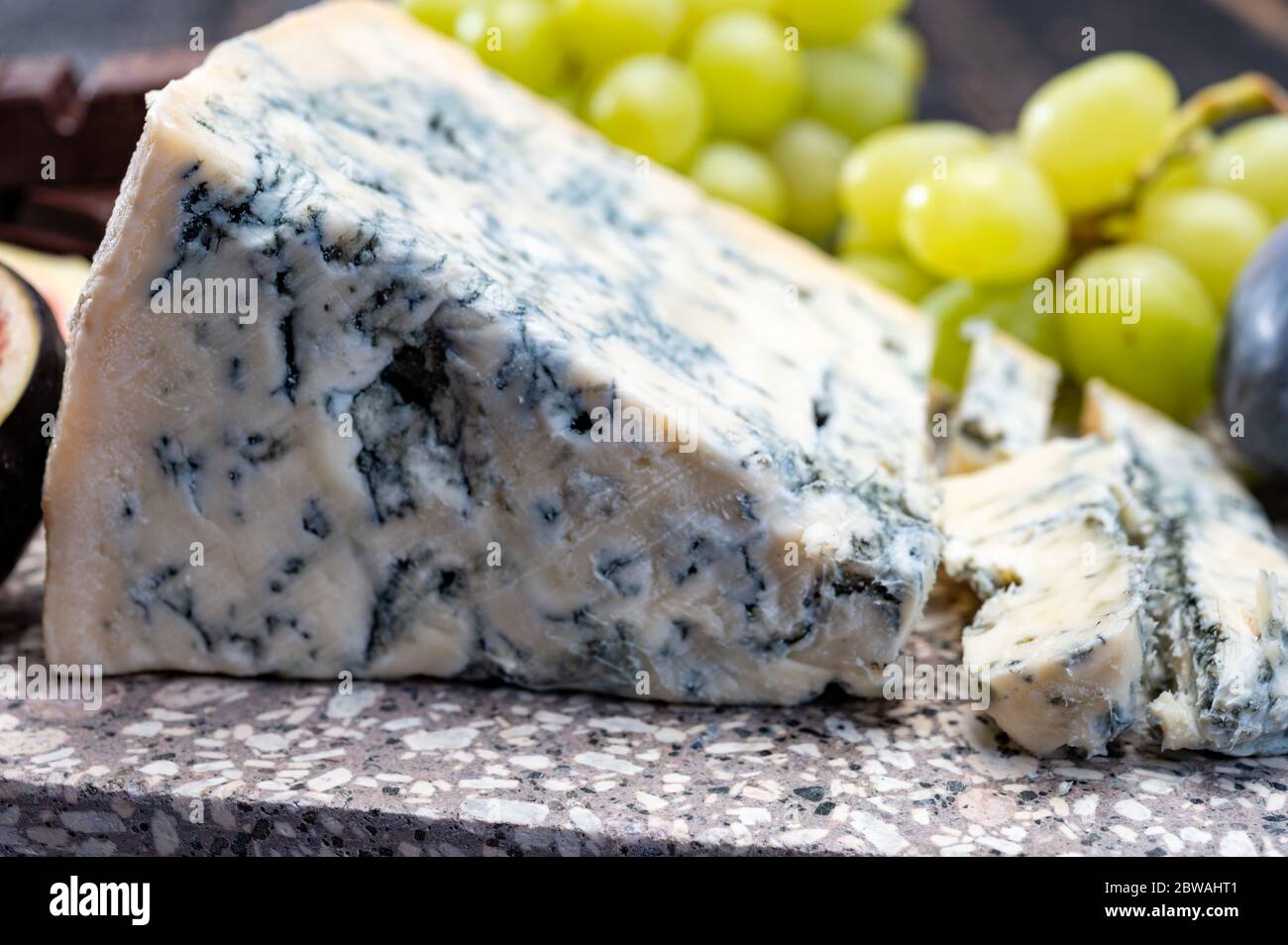 Cheese collection, piece of italian blue cheese gorgonzola picante with ...