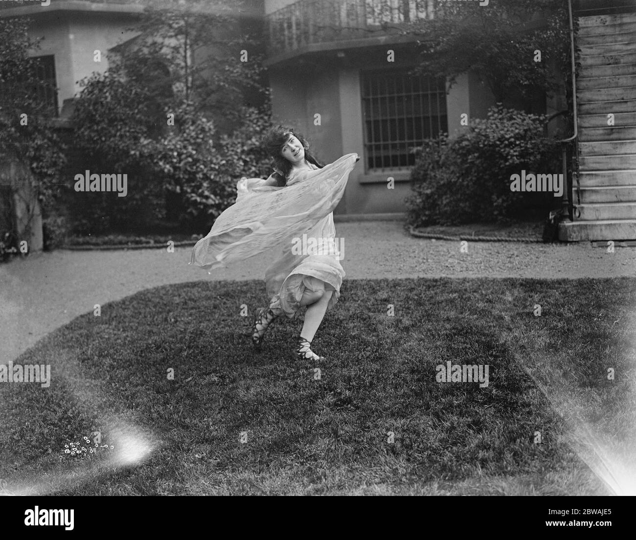 Miss Helen May dancing in her london garden Stock Photo - Alamy