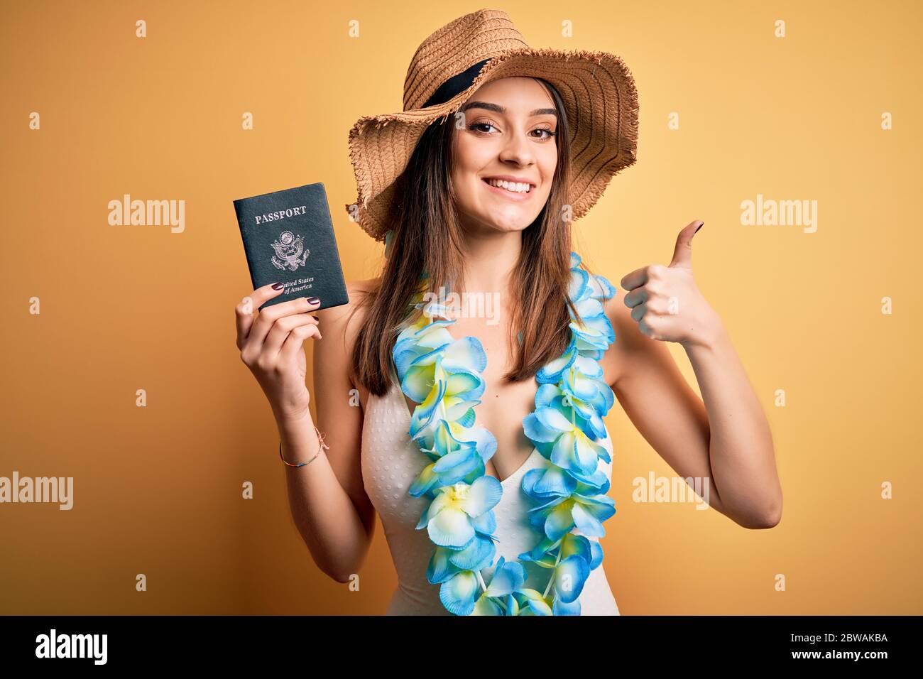 Cheerful brunette woman wearing swimsuit hi-res stock photography and ...