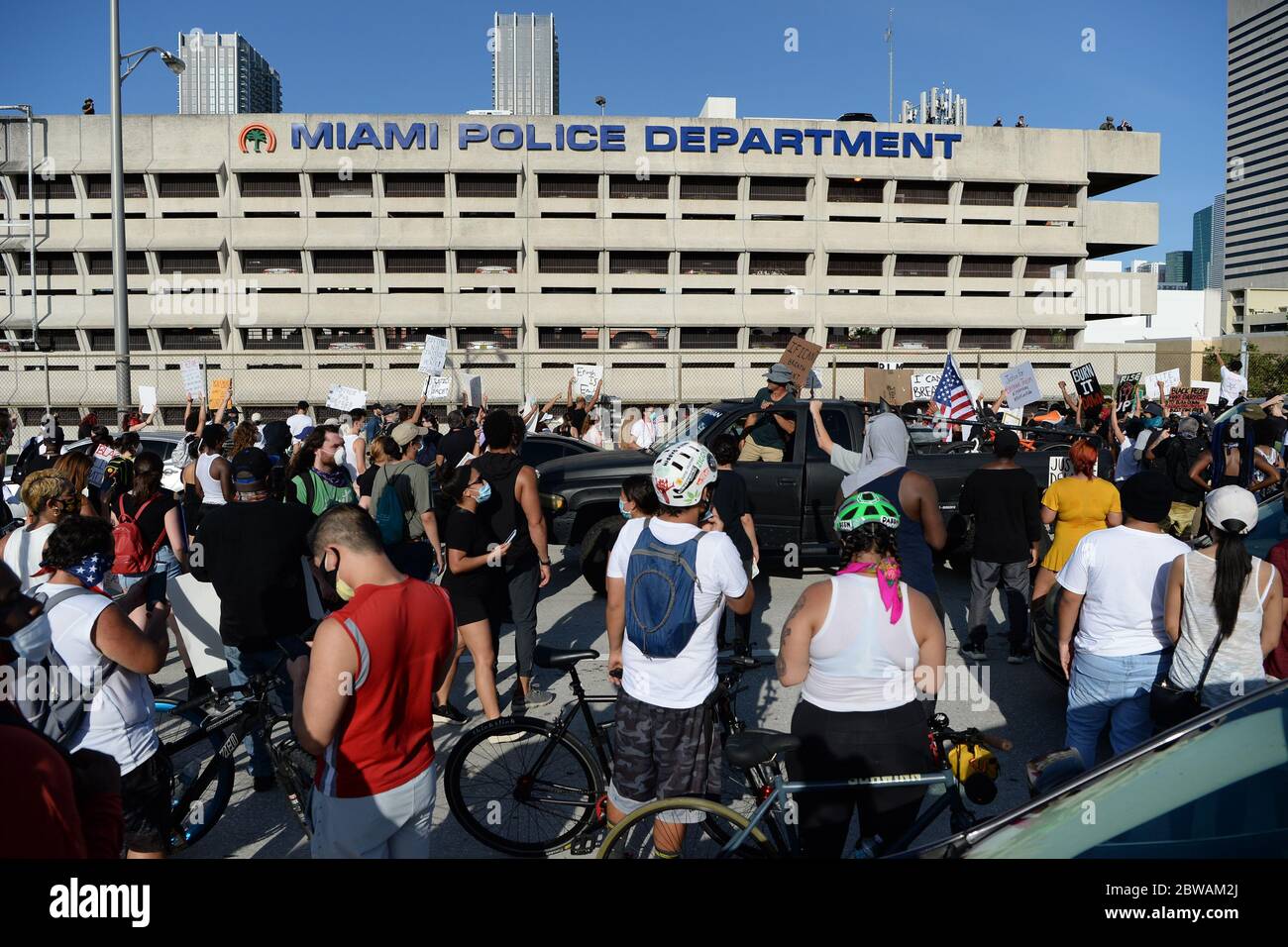 Miami, FL, USA. 30th May, 2020. Protestors are seen walking on ...