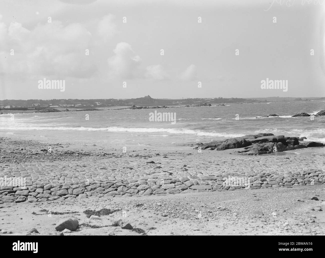 Cobo bay beach hi-res stock photography and images - Alamy