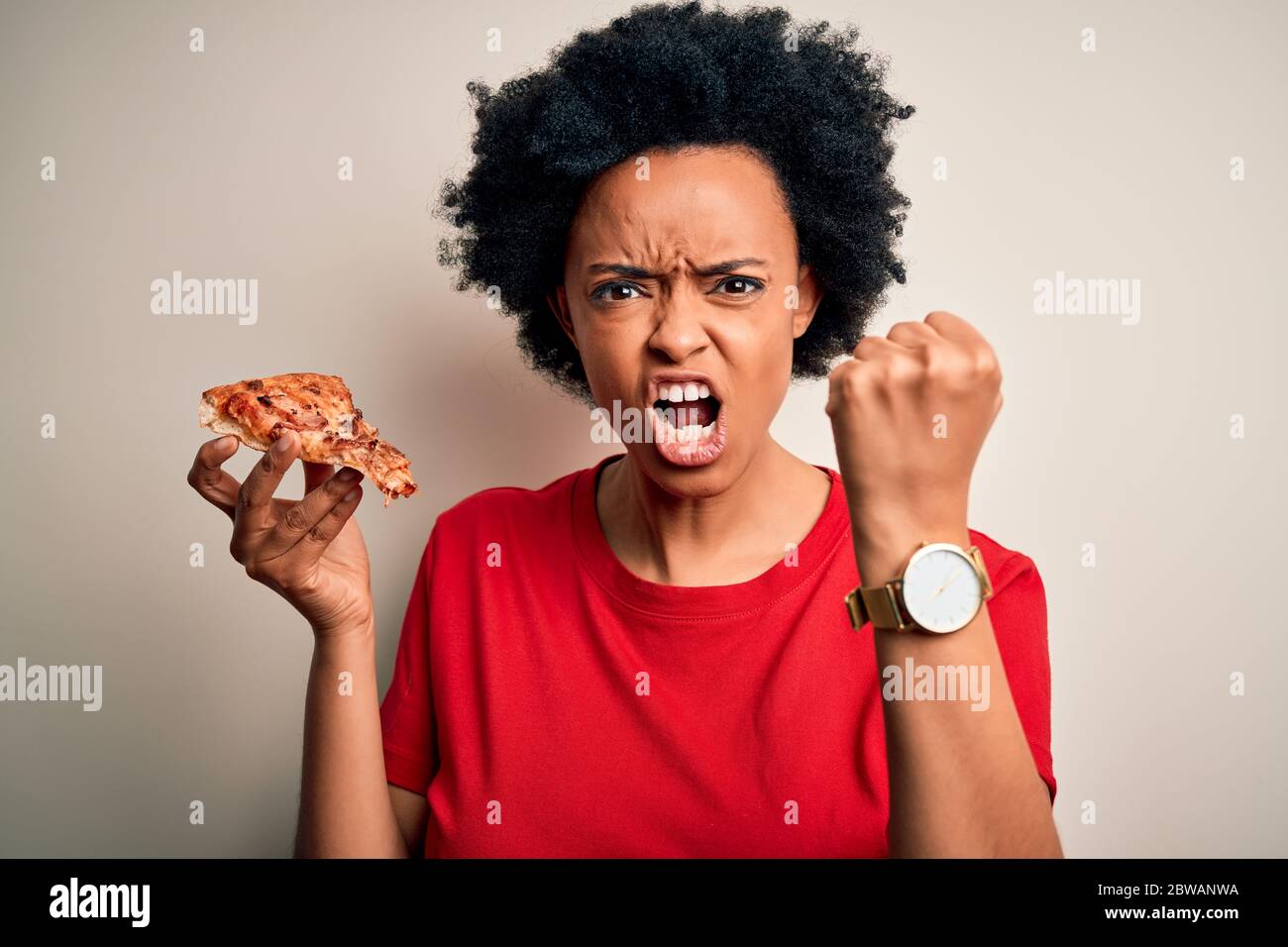 Angry woman eating of cheese hi-res stock photography and images - Alamy