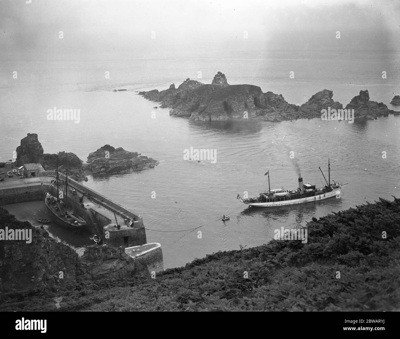 Sark, channel islands harbour Black and White Stock Photos & Images - Alamy