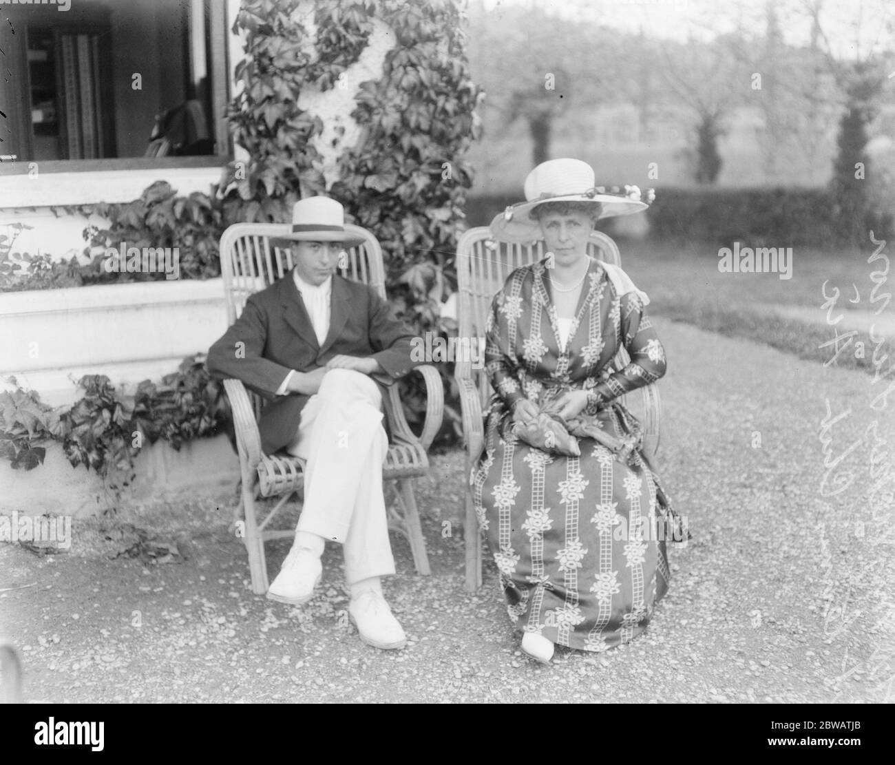 Hon Mrs Vickers and her son at Six Le Bain 1922 Stock Photo - Alamy
