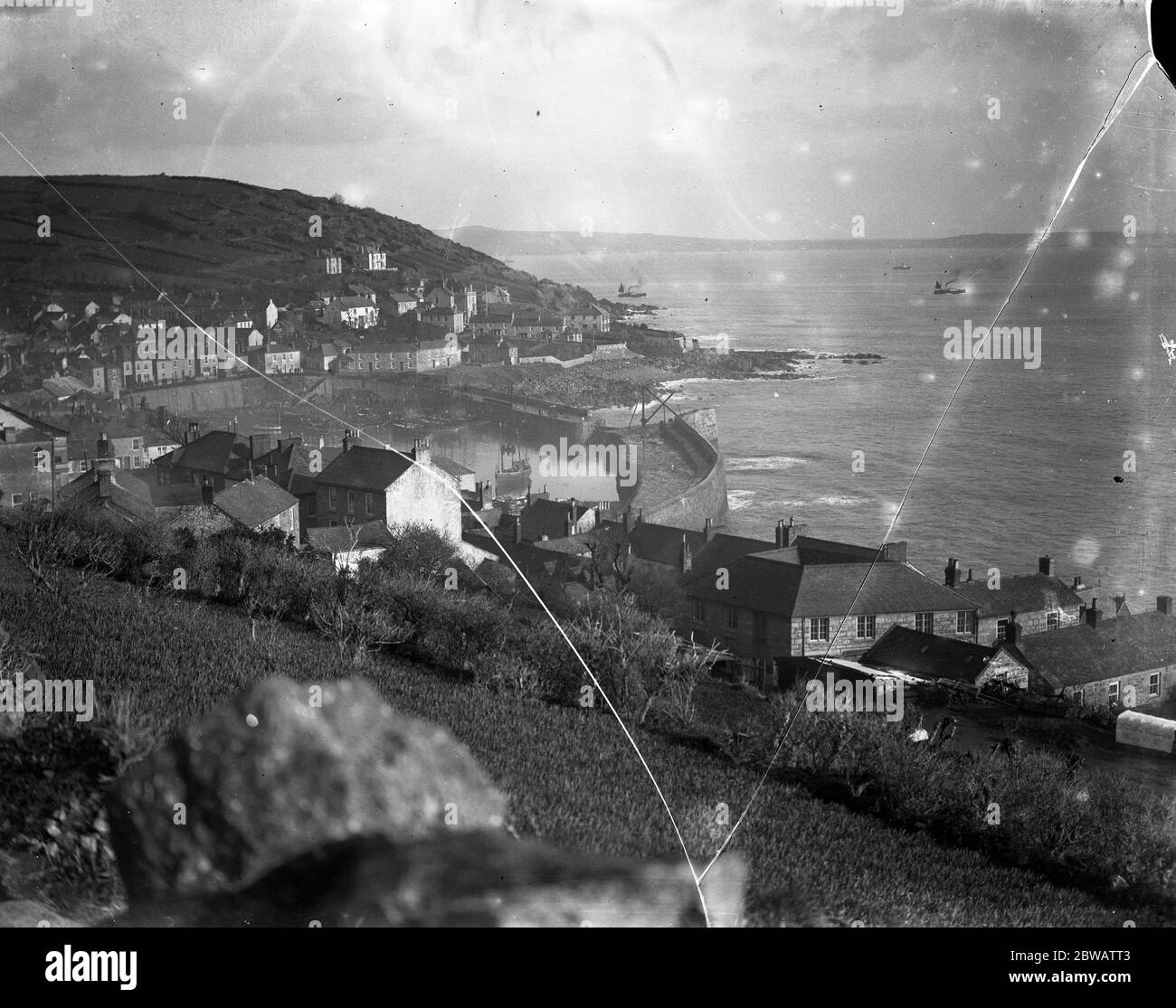 General view of the town and harbour at Mousehole , Cornwall . 1929 ...