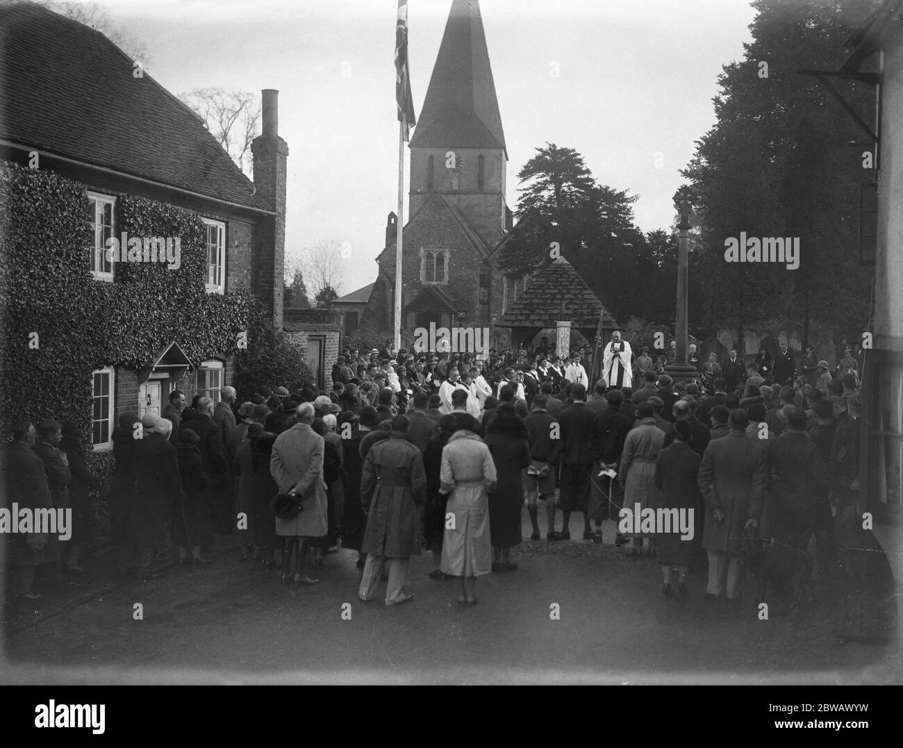 Armistice Day at Shere , Surrey . The scene at the memorial outside the ...