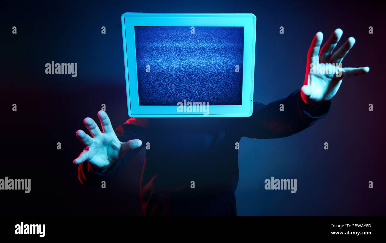 Man cyberpunk with a monitor instead of a head, computer addiction and ...