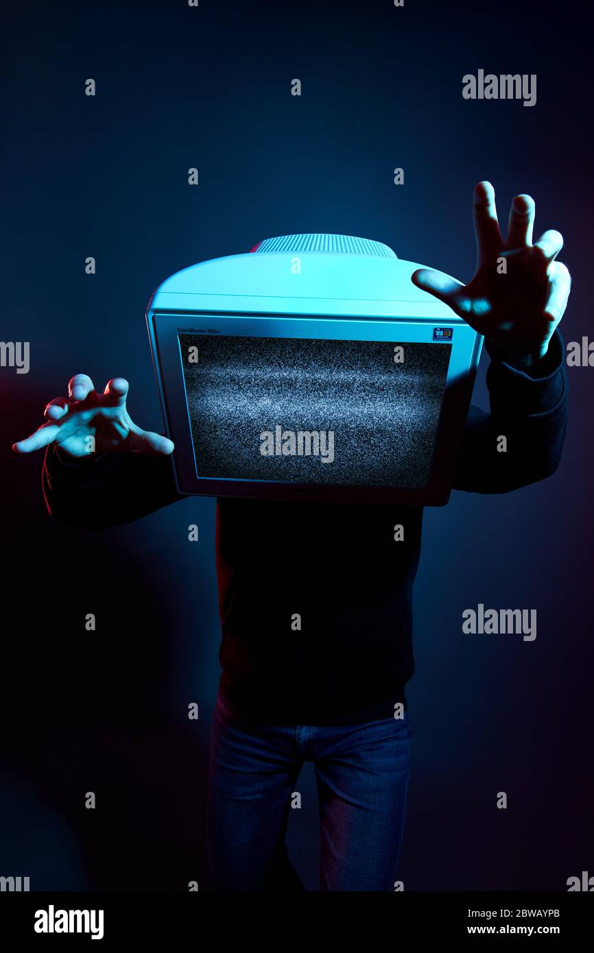Man cyberpunk with a monitor instead of a head, computer addiction and ...