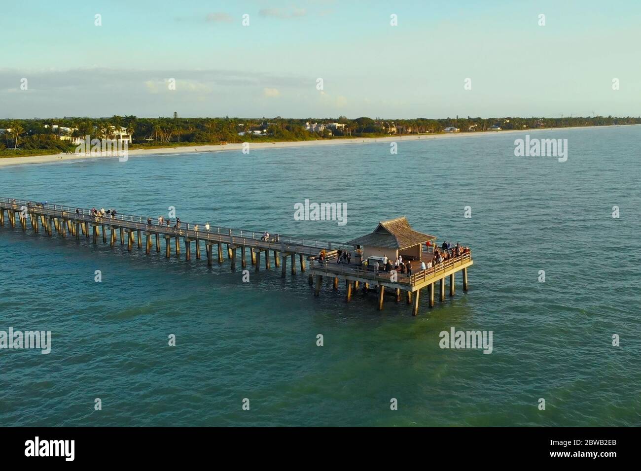 Naples Beach and Fishing Pier at Sunset, Florida Stock Photo - Alamy