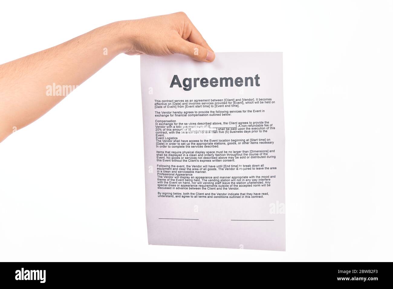 Holding agreement paper over isolated white background Stock Photo - Alamy