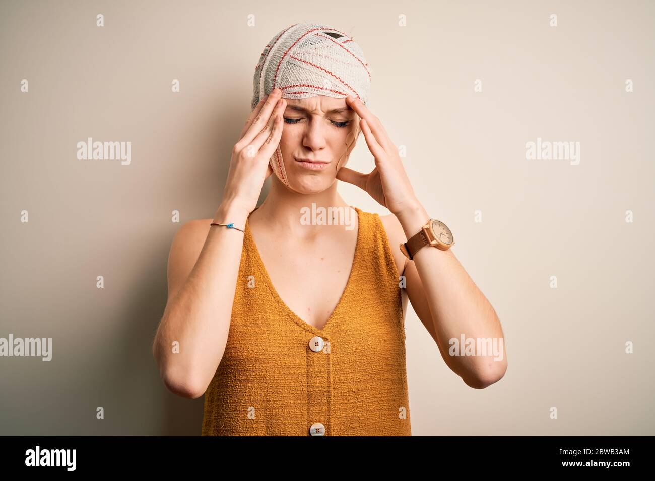 Young beautiful redhead woman injured for accident wearing bandage on ...