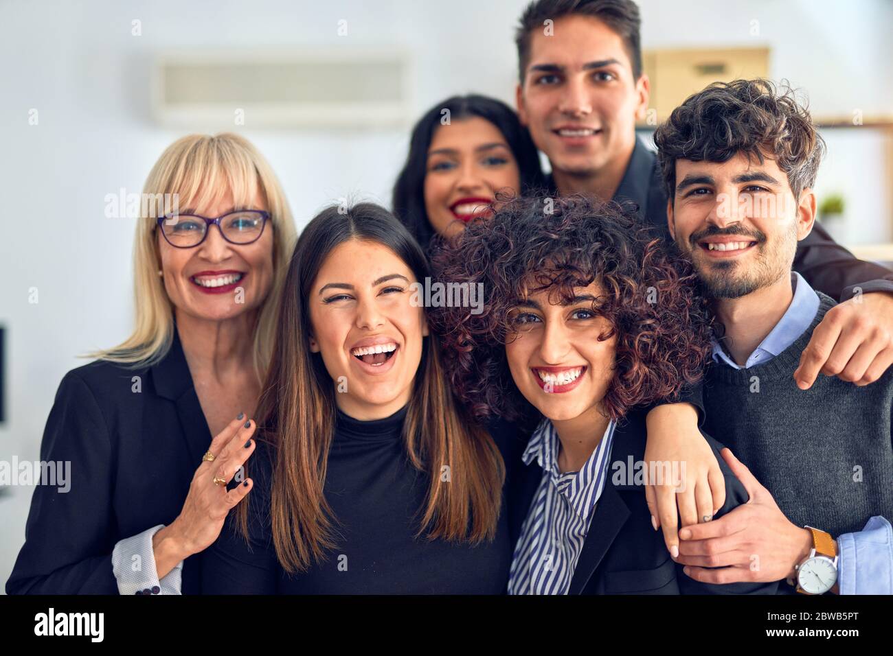 Group of business workers smiling happy and confident. Posing together ...