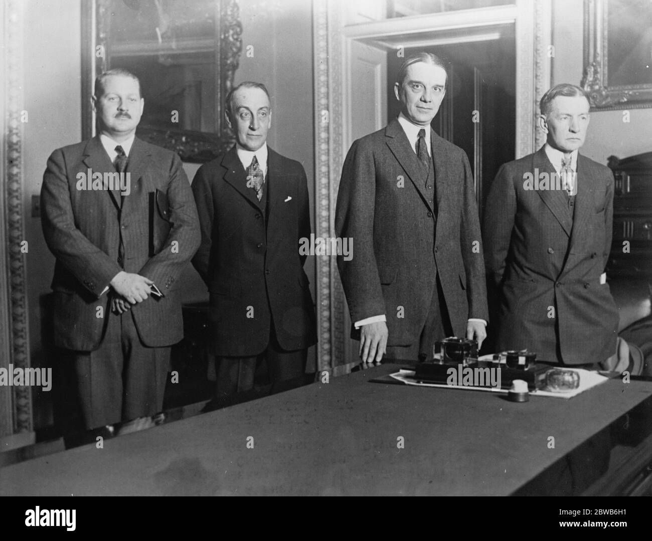 The American Reparation representatives photographed . Left to right ...