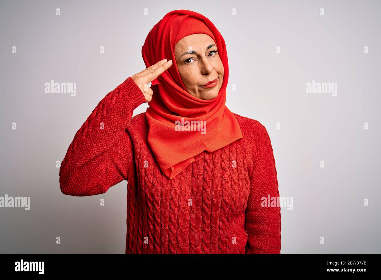 Middle age brunette woman wearing muslim traditional hijab over ...