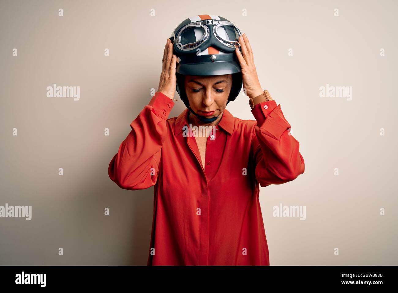 Old woman wearing helmet isolated hi-res stock photography and images ...
