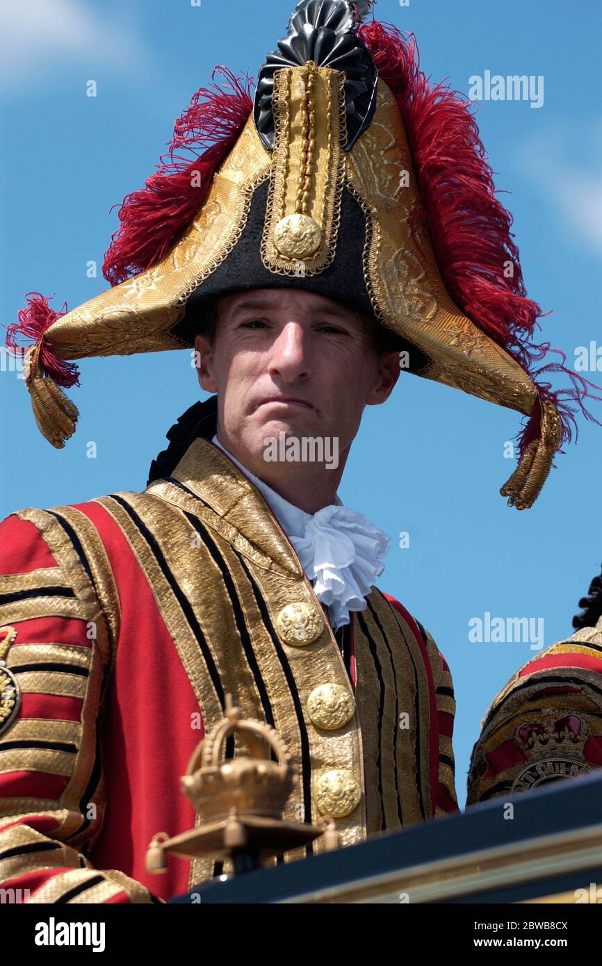 footman on Queens coach Stock Photo - Alamy