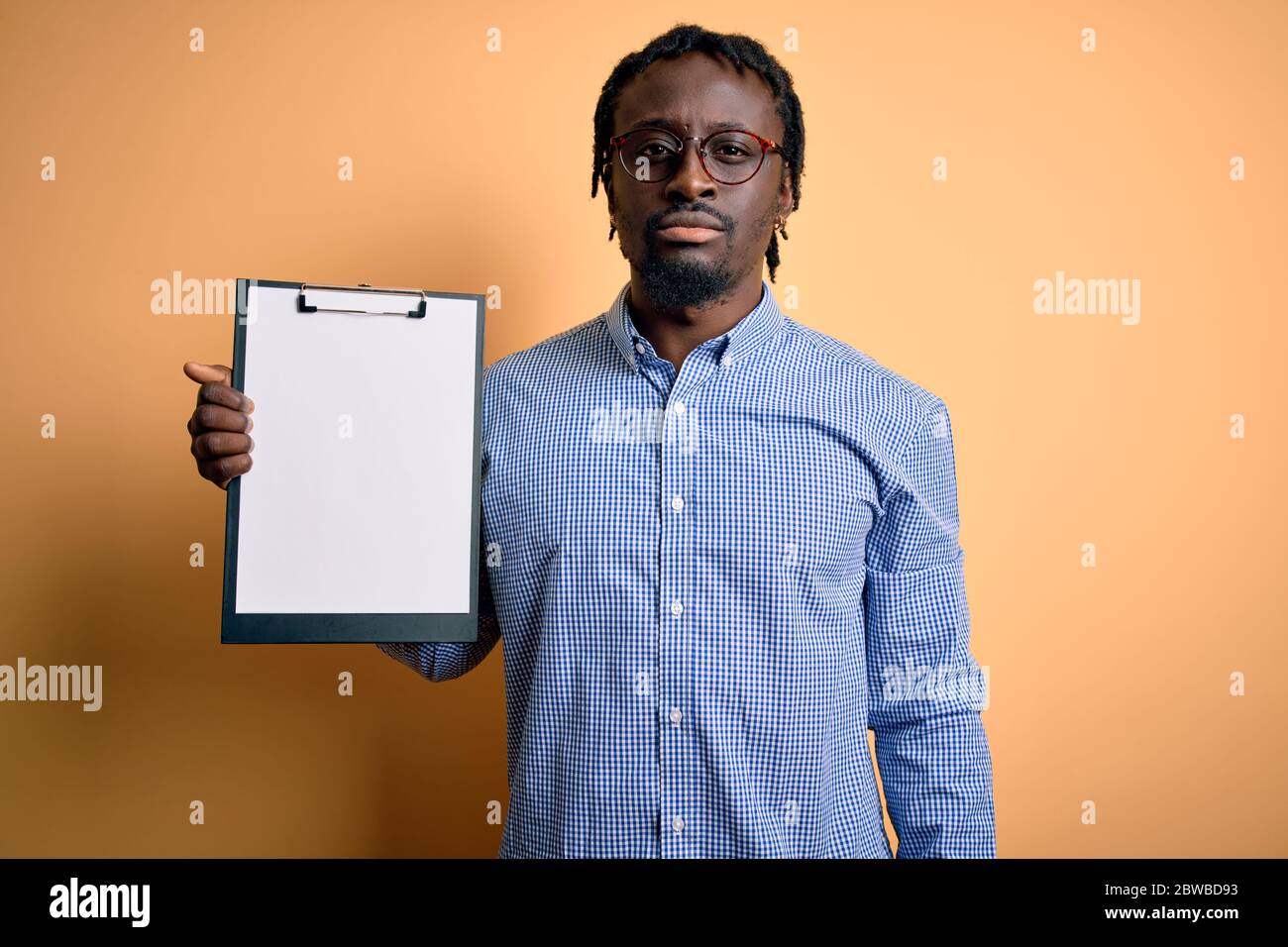 Young man thinking checklist hi-res stock photography and images - Alamy