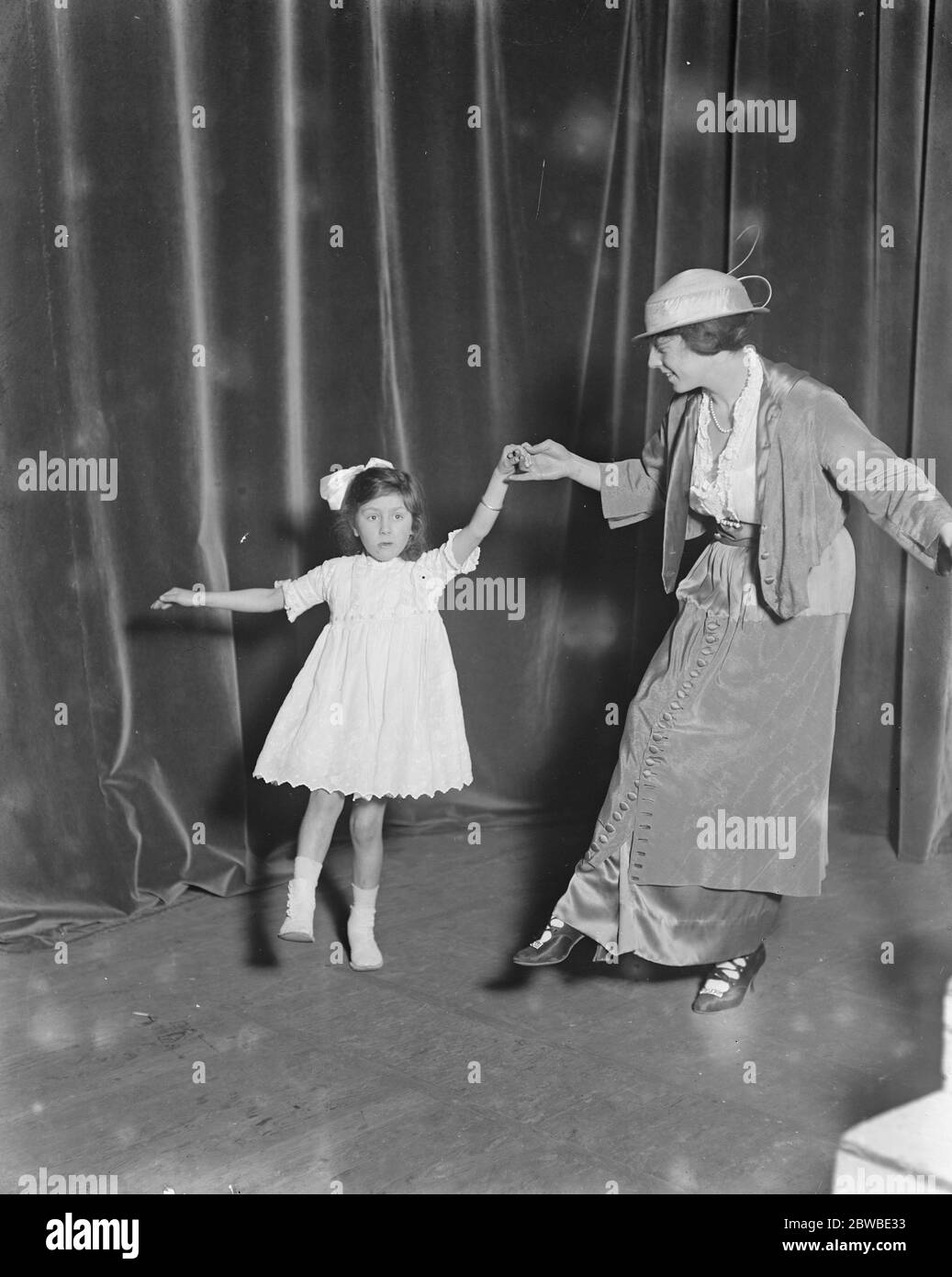 Miss Teddie Gerrard teaching Gwennie Seabrook to dance Stock Photo - Alamy