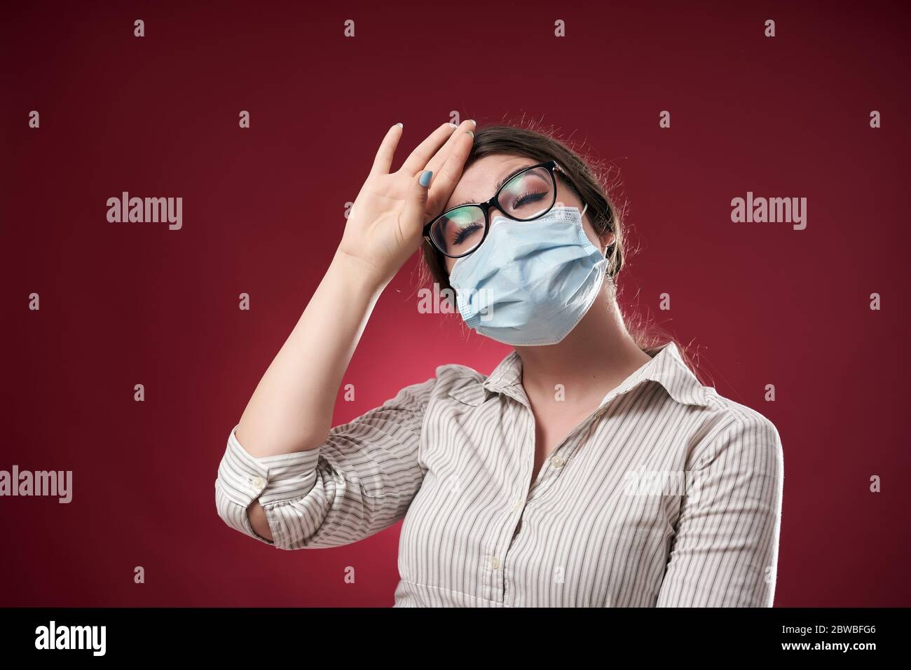 Overworked exhausted businesswoman with face mask Stock Photo - Alamy