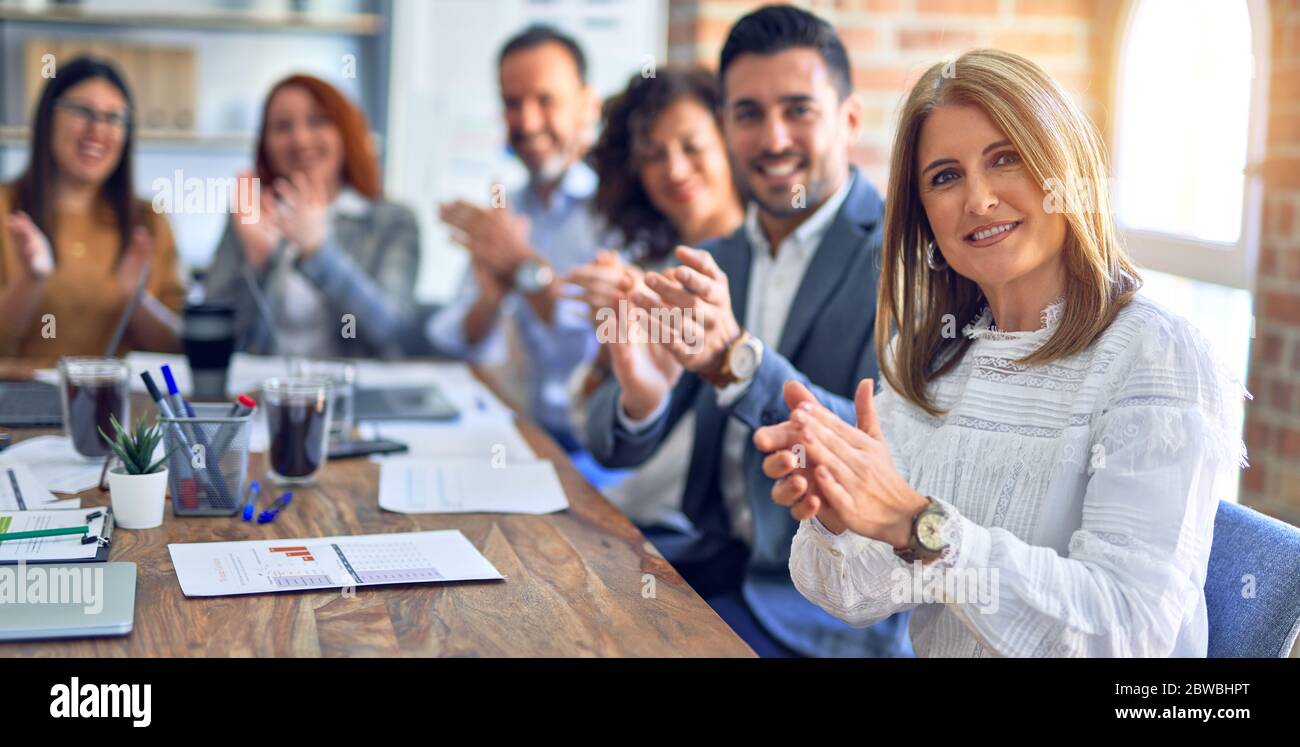Group of business workers smiling happy and confident. Working together ...