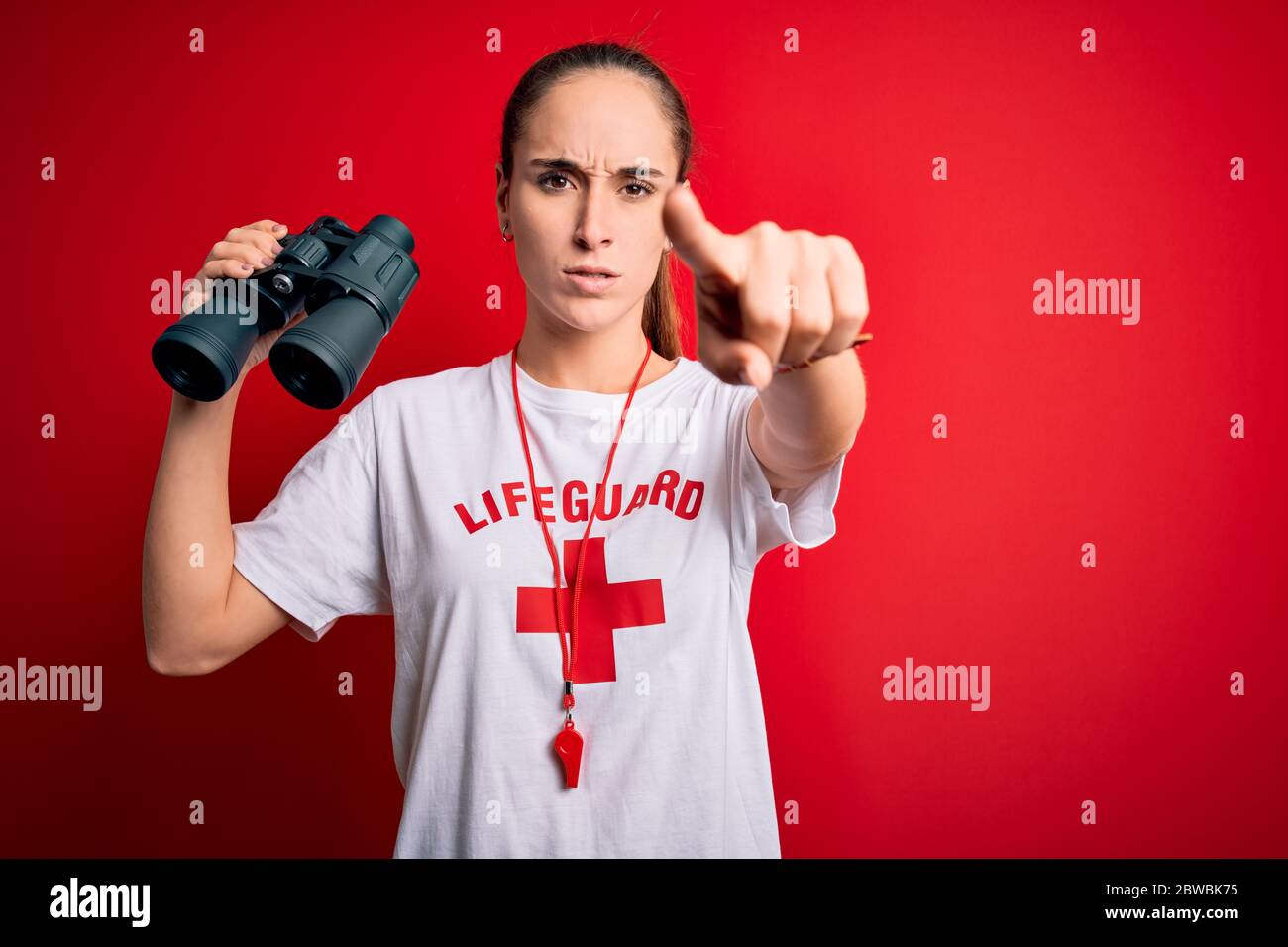 Young beautiful lifeguard woman hi-res stock photography and images - Alamy