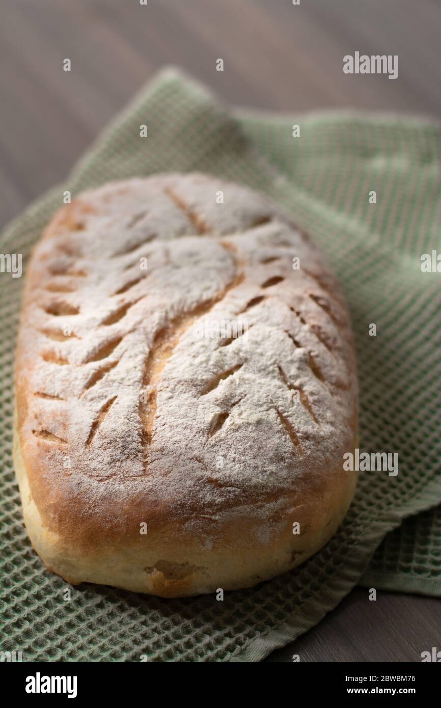 Homemade artisan sourdough bread loaf with artistic leaf pattern ...