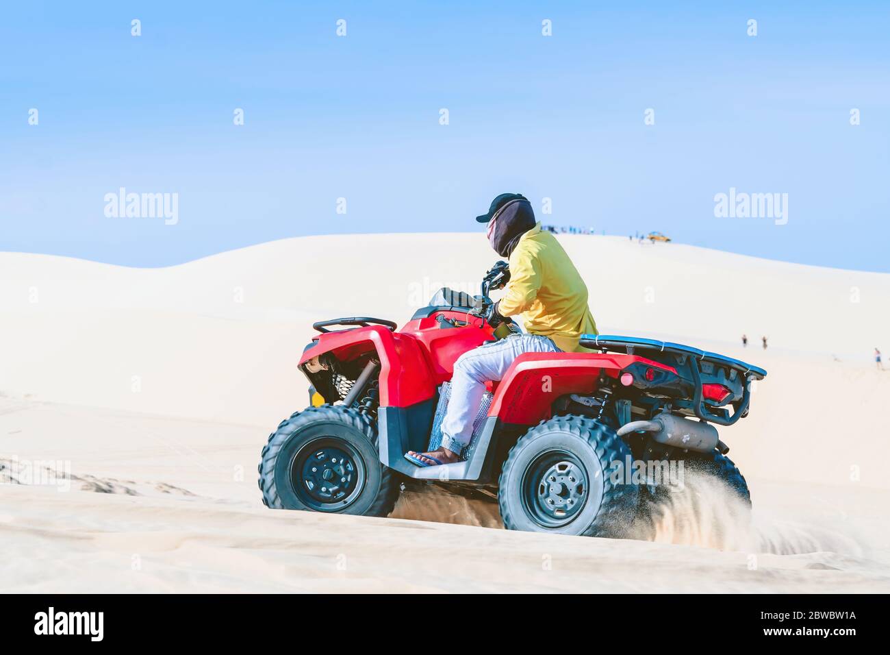 Tourist enjoy riding the quad bike or powerful fast off-road four-wheel ...
