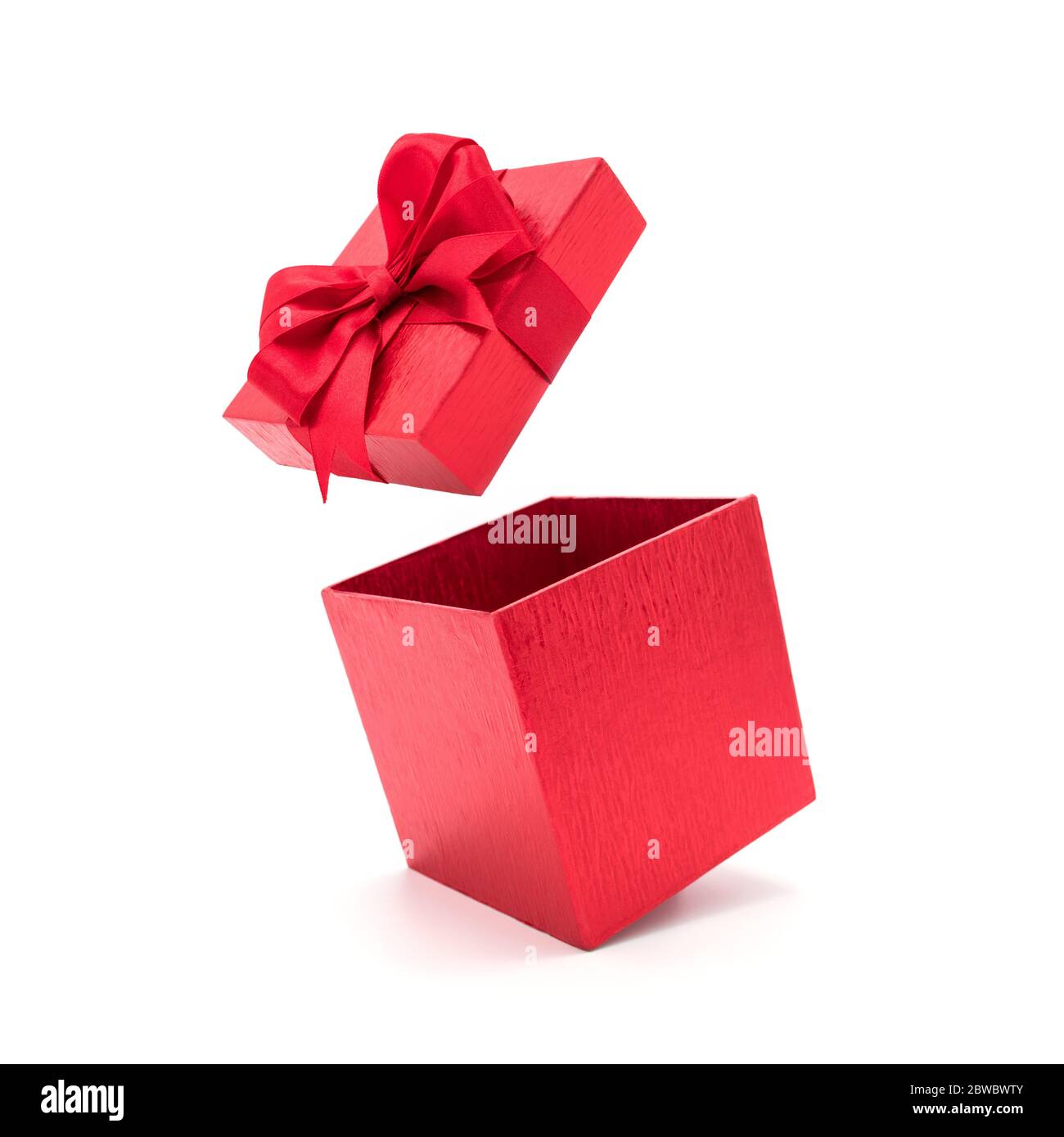 Open beautiful red gift box with ribbon isolated on white background ...