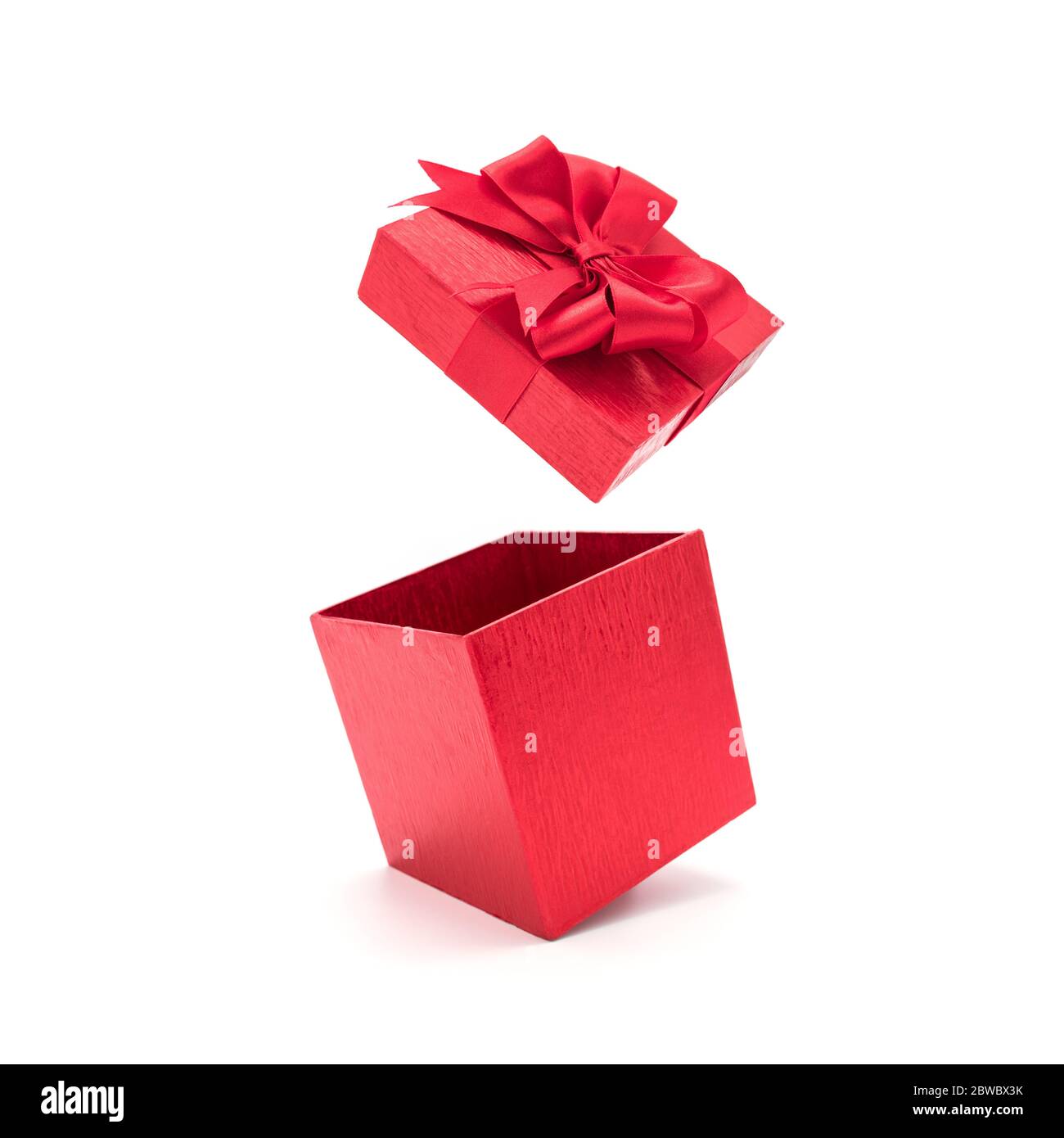 Open red gift box with ribbon isolated on white background Stock Photo ...