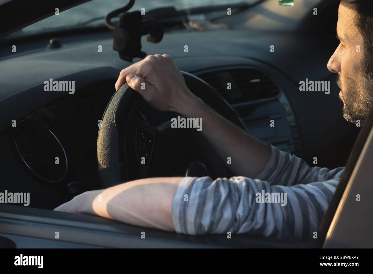 Man inside car sharing vehicle hi-res stock photography and images - Alamy